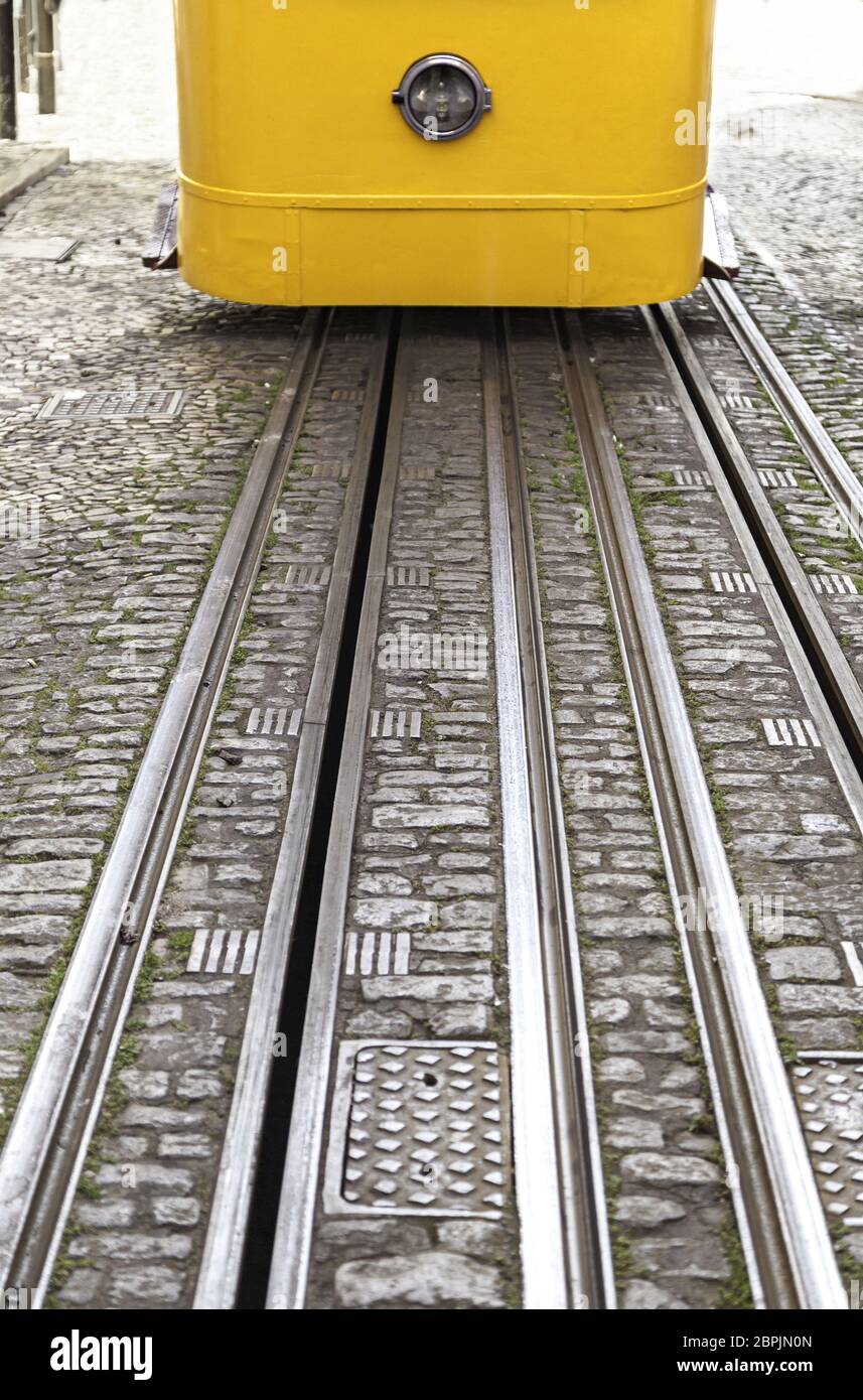 Old yellow tram of Lisbon, detail of an ancient means of transport ...