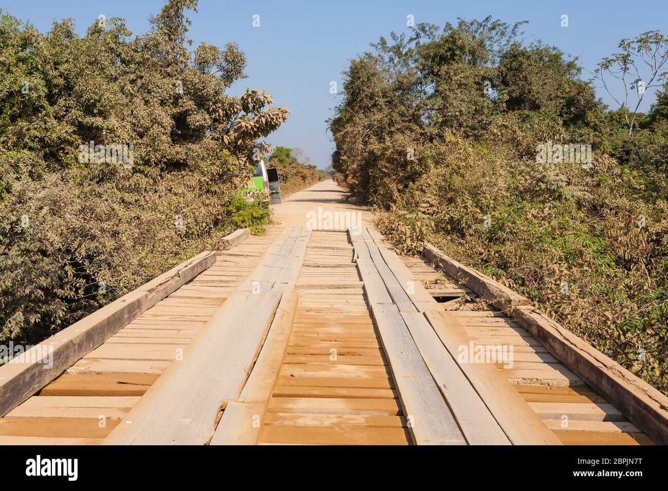 Wooden bridge in perspective. Famous Brazilian Transpantaneira dirt ...