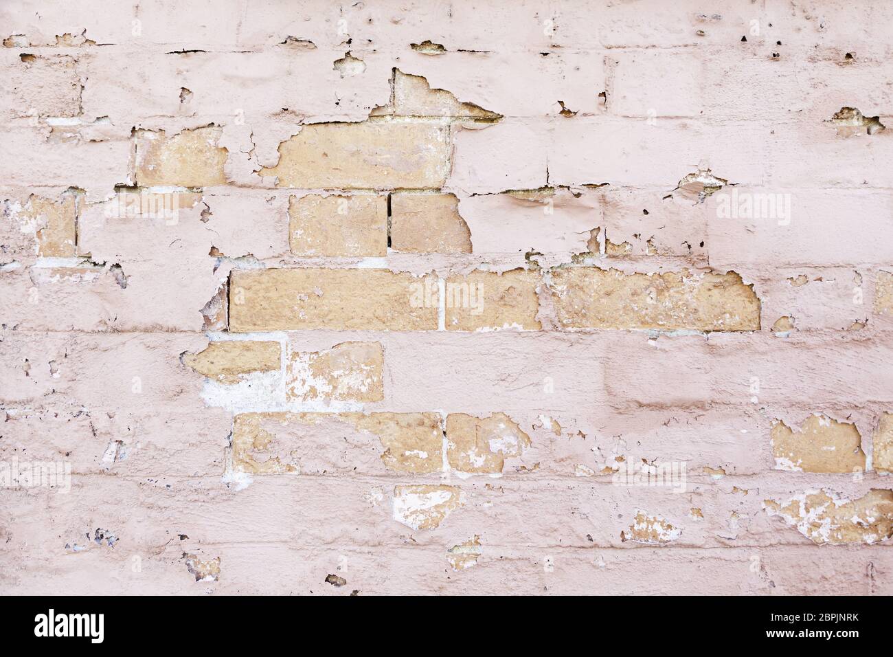 Brick Wall battered and abandoned, detail of a wall in the city in ...