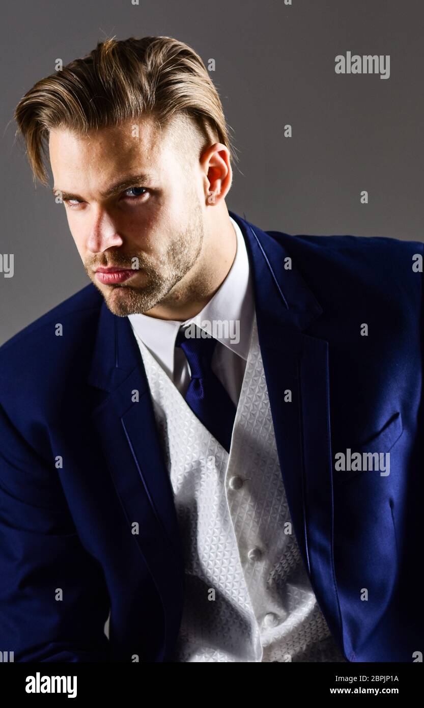 Man In Classic Suit Or Businessman With Mysterious Face On Dark