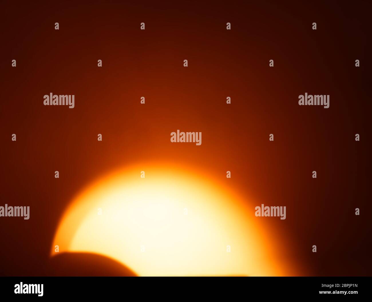 Glowing bottom aligned light bulb background Stock Photo - Alamy