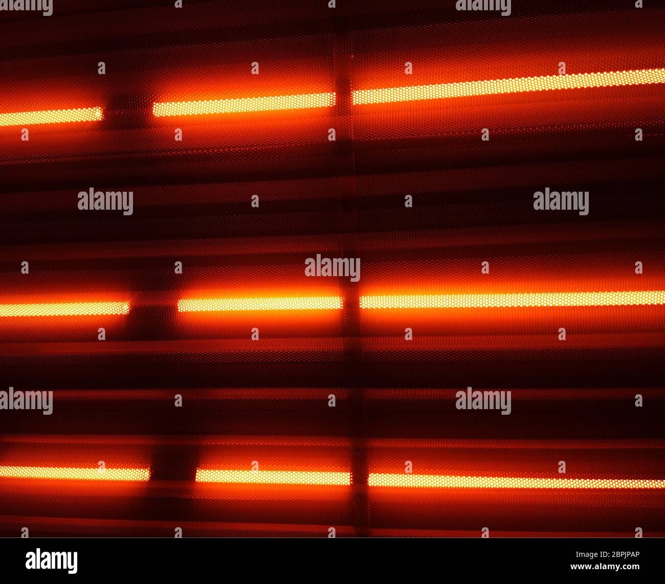 Neon orange led lamps background Stock Photo - Alamy