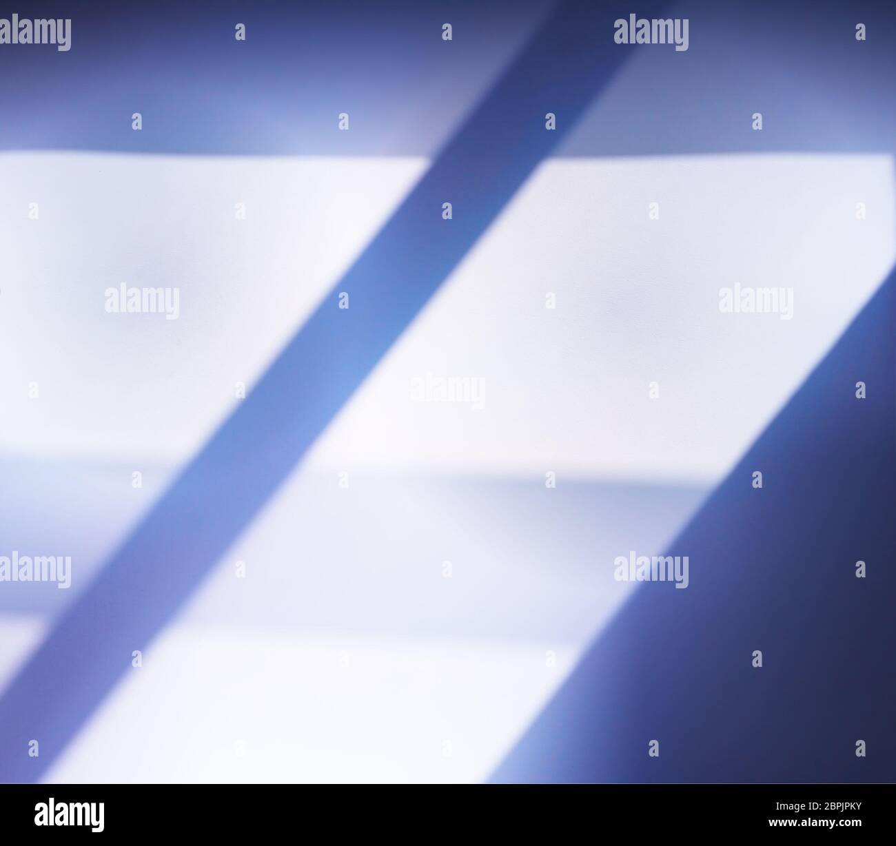 Diagonal light rays falling on wall building backdrop Stock Photo - Alamy