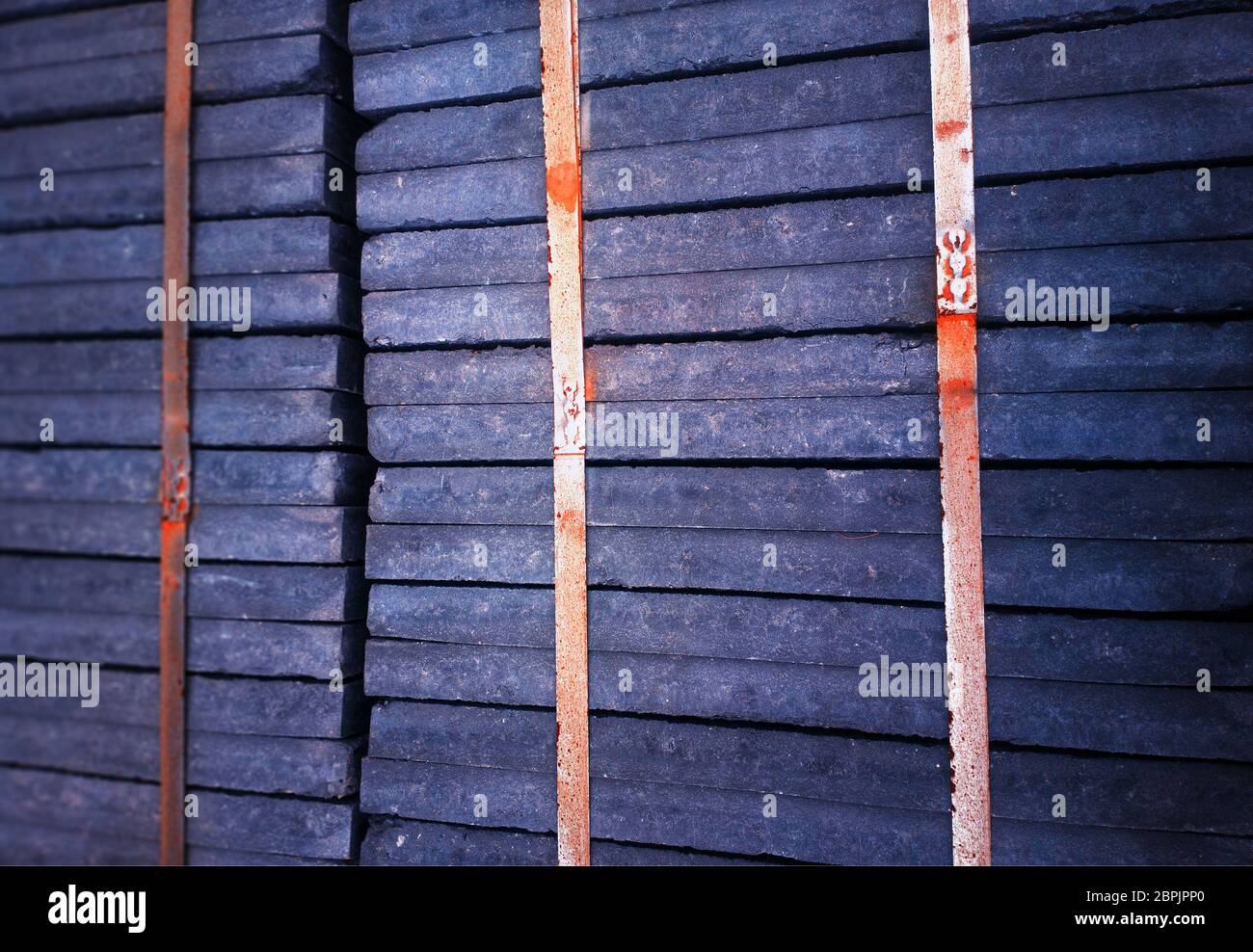 Pack of asphalt blocks for street pavement background Stock Photo - Alamy