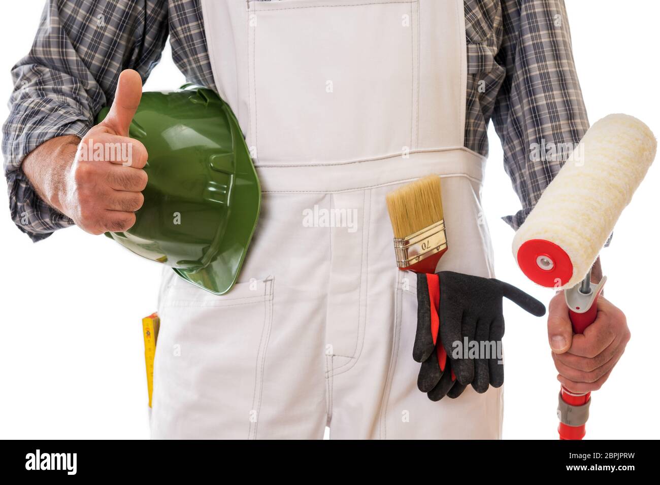 House painter worker in white work overalls with thumb up, holds in his ...