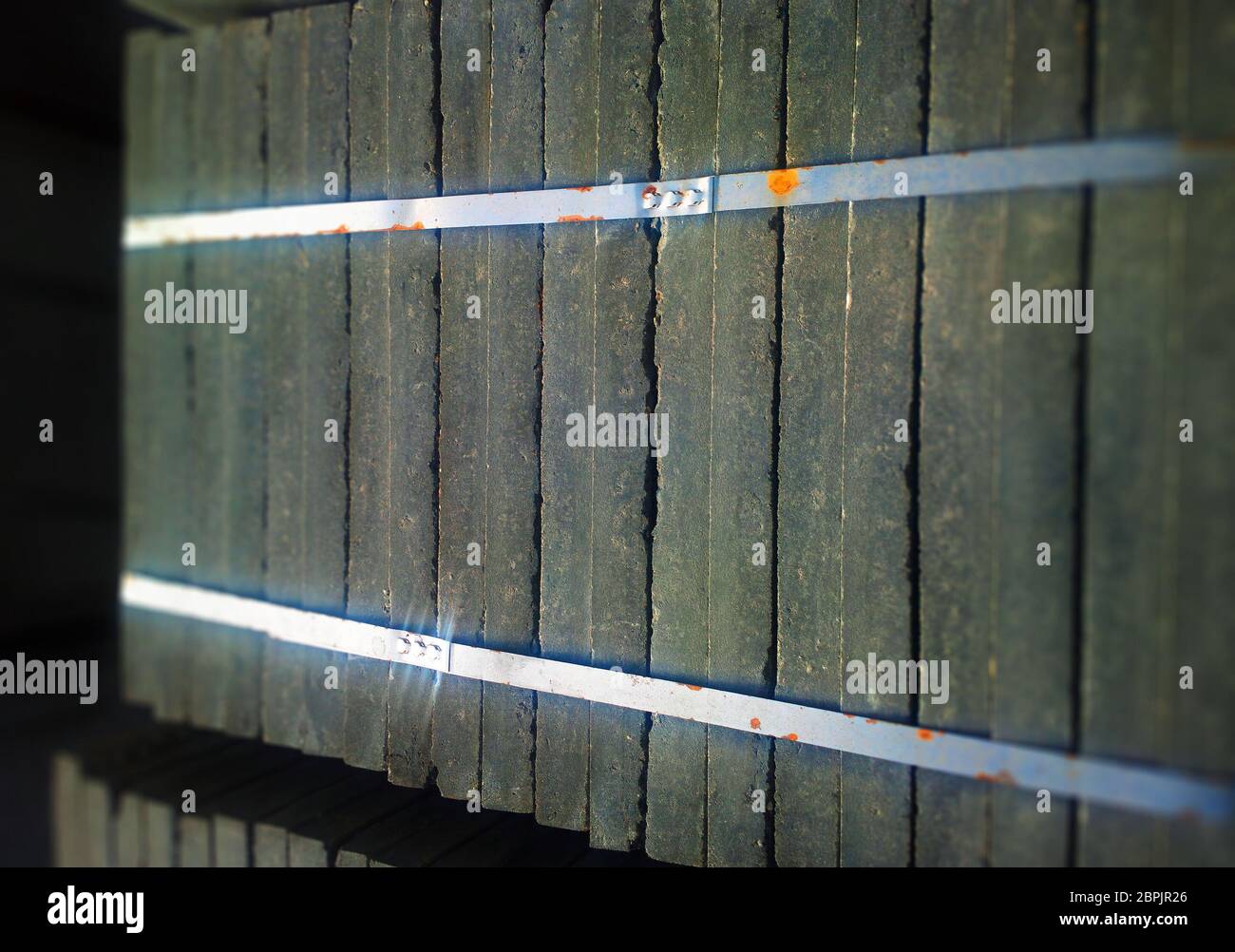 Packed concrete blocks for pavement works background Stock Photo - Alamy