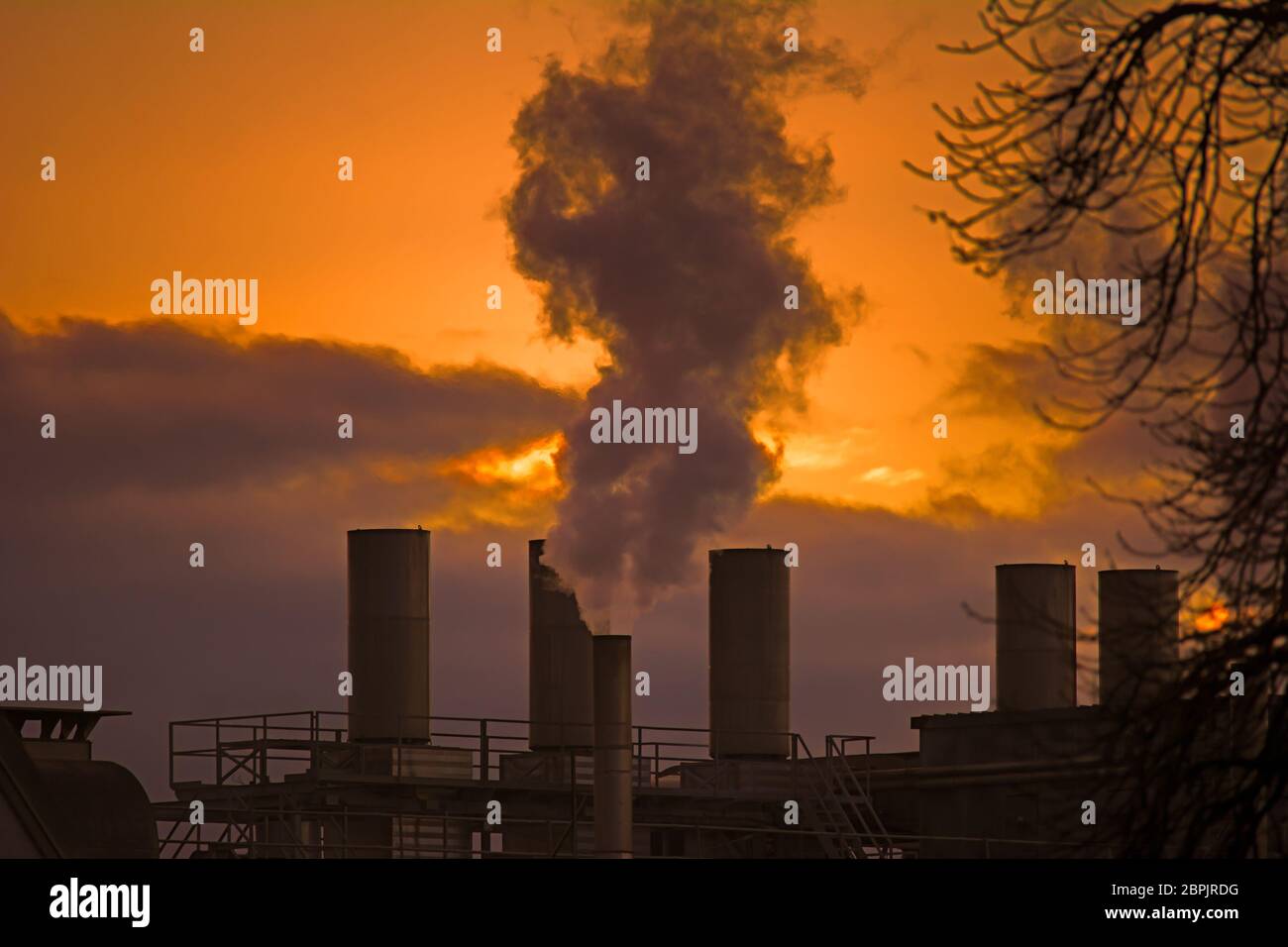 Smoke from industrial chimneys dawn hi-res stock photography and images ...