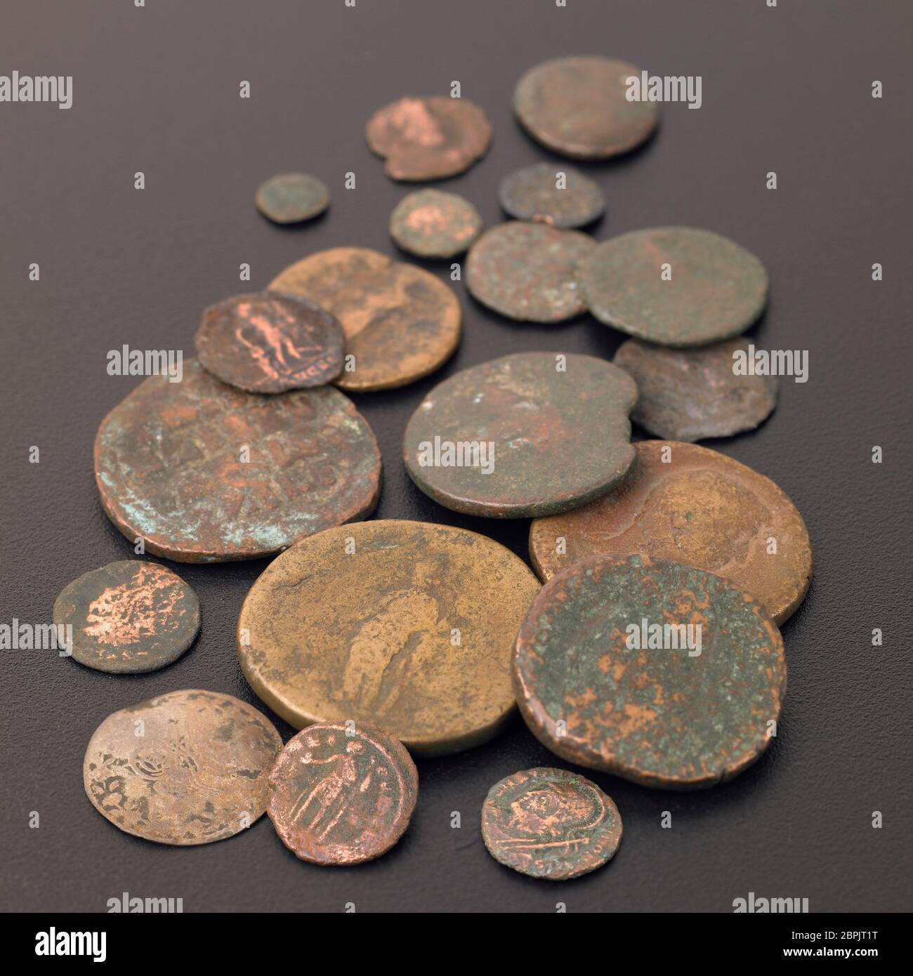 Mixed coins from Ancient Rome Stock Photo - Alamy