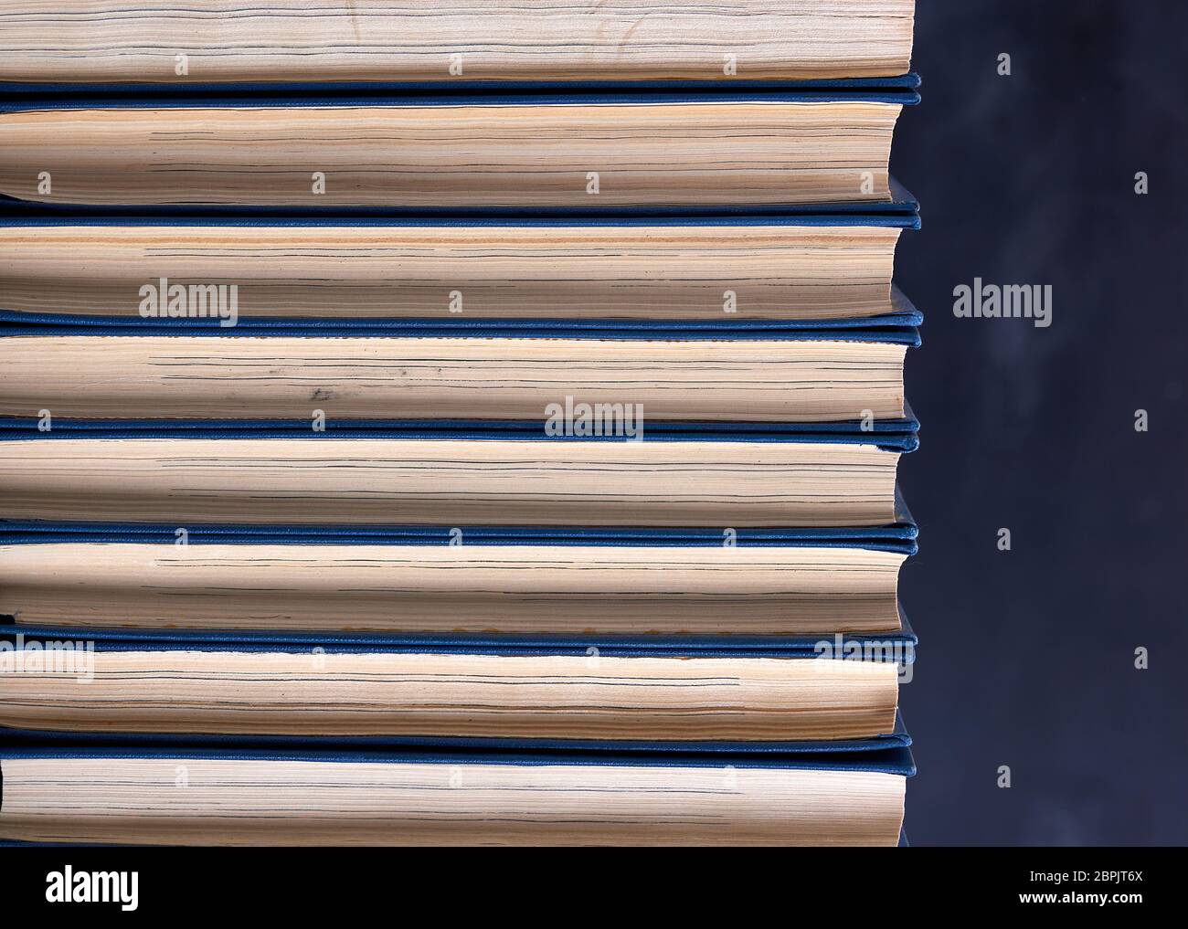 stack of books with a blue cover and yellow pages, close up Stock Photo ...