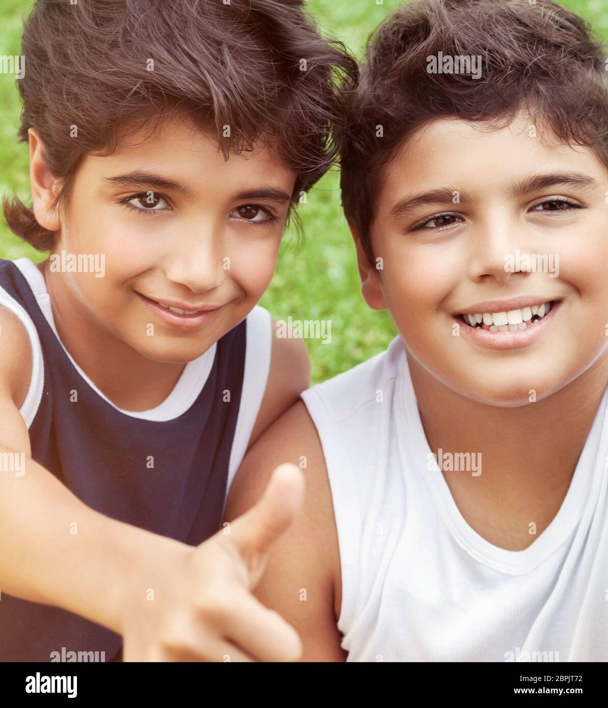 Closeup portrait of a two happy smiling boys, best friends with ...