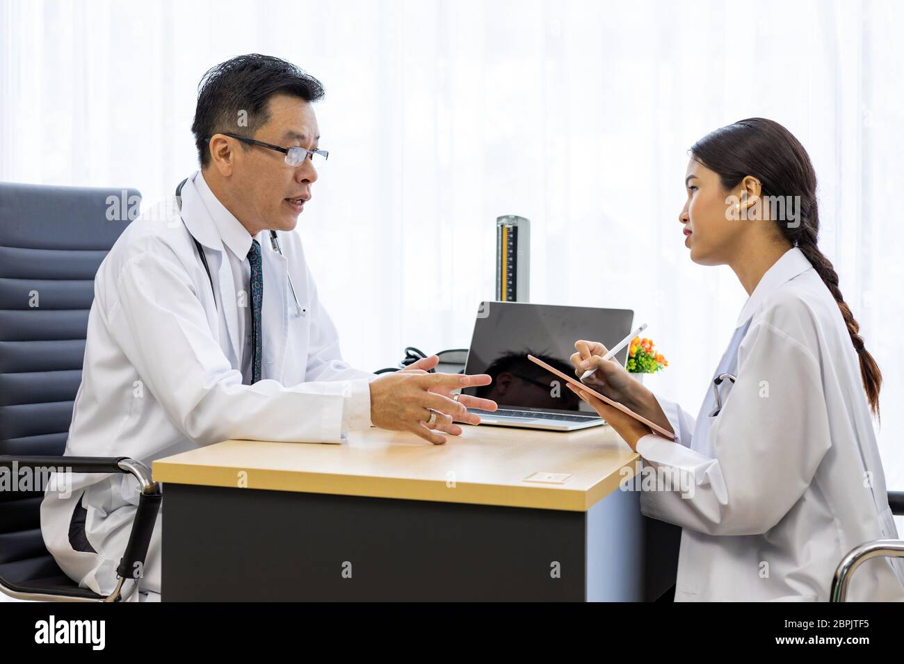 Two doctors in discussion digital hi-res stock photography and images ...
