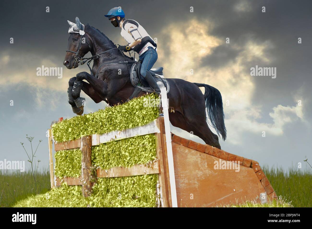 Jumping over a fence hi-res stock photography and images - Alamy