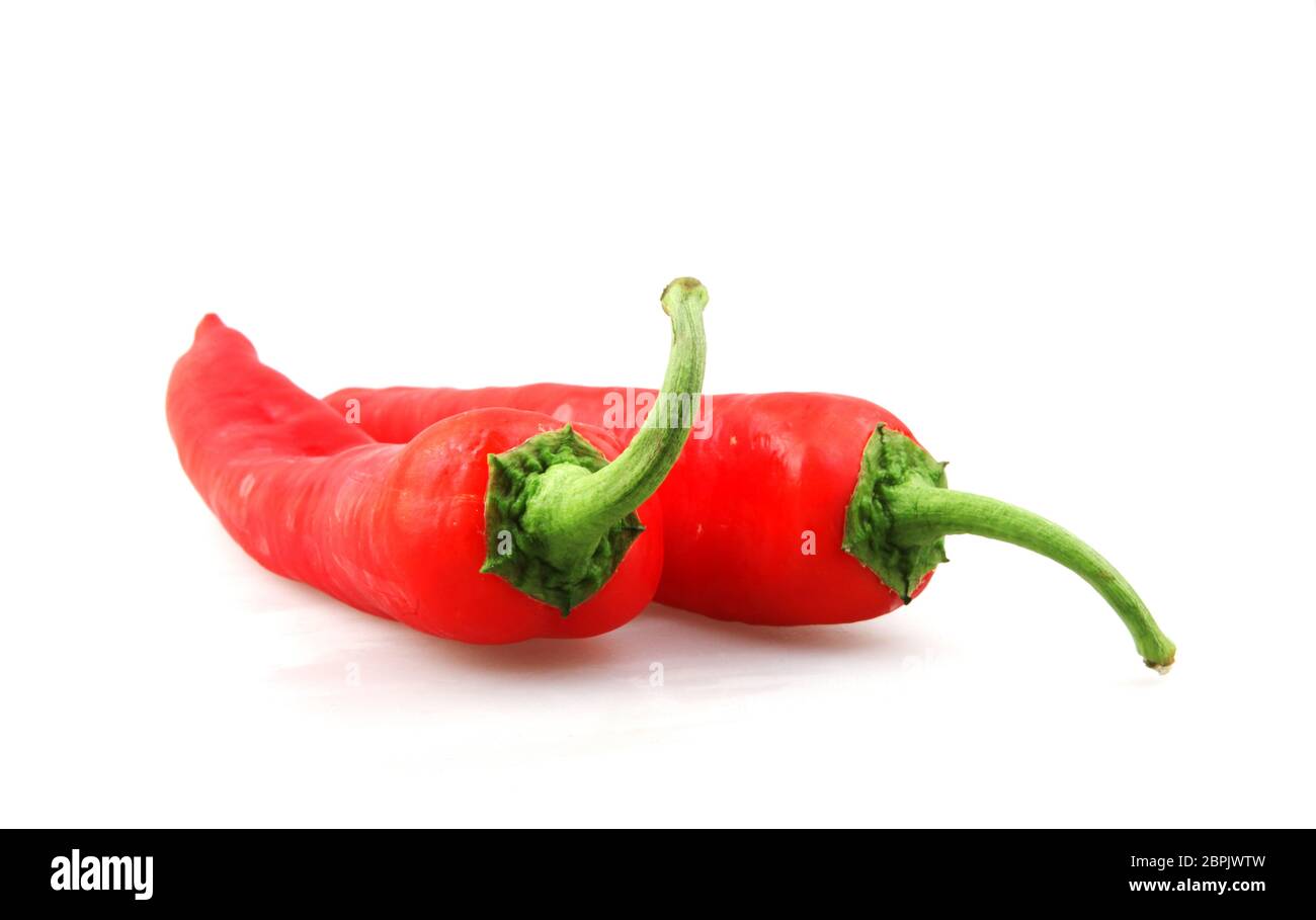 Close-Up Of Red Chili Pepper Against White Background Stock Photo - Alamy