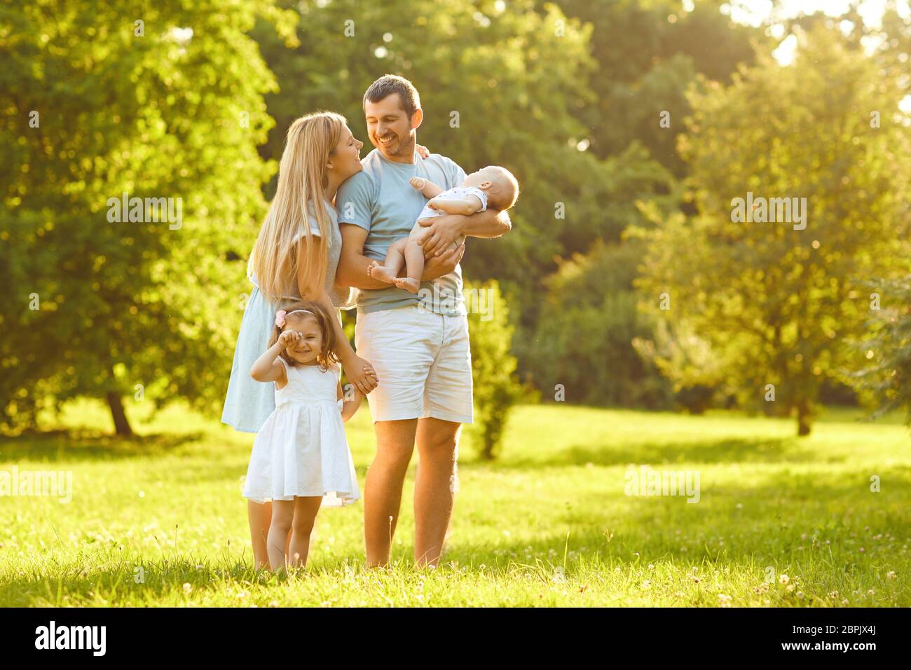 Family mother father daughter stands hi-res stock photography and ...