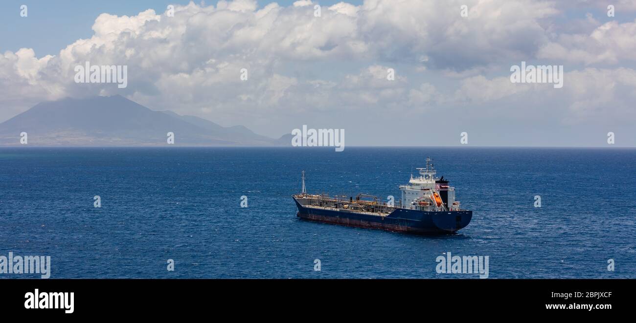 Old oil tanker moving towards St. Eustatius island in the Caribbean ...