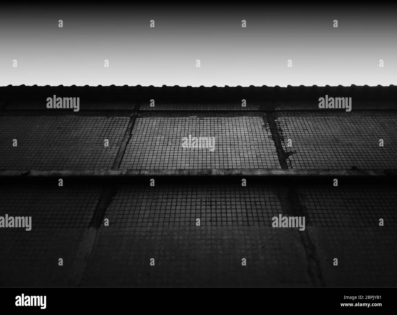 Black and white symmetrical building wall backdrop Stock Photo - Alamy