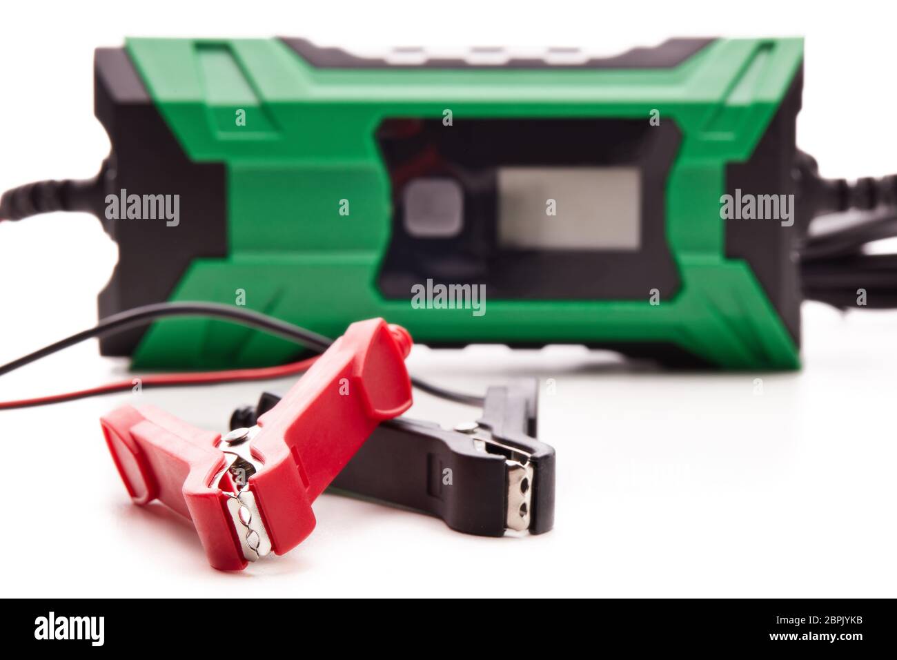 Smart multi purpose battery charger. Car battery charger isolated on a ...