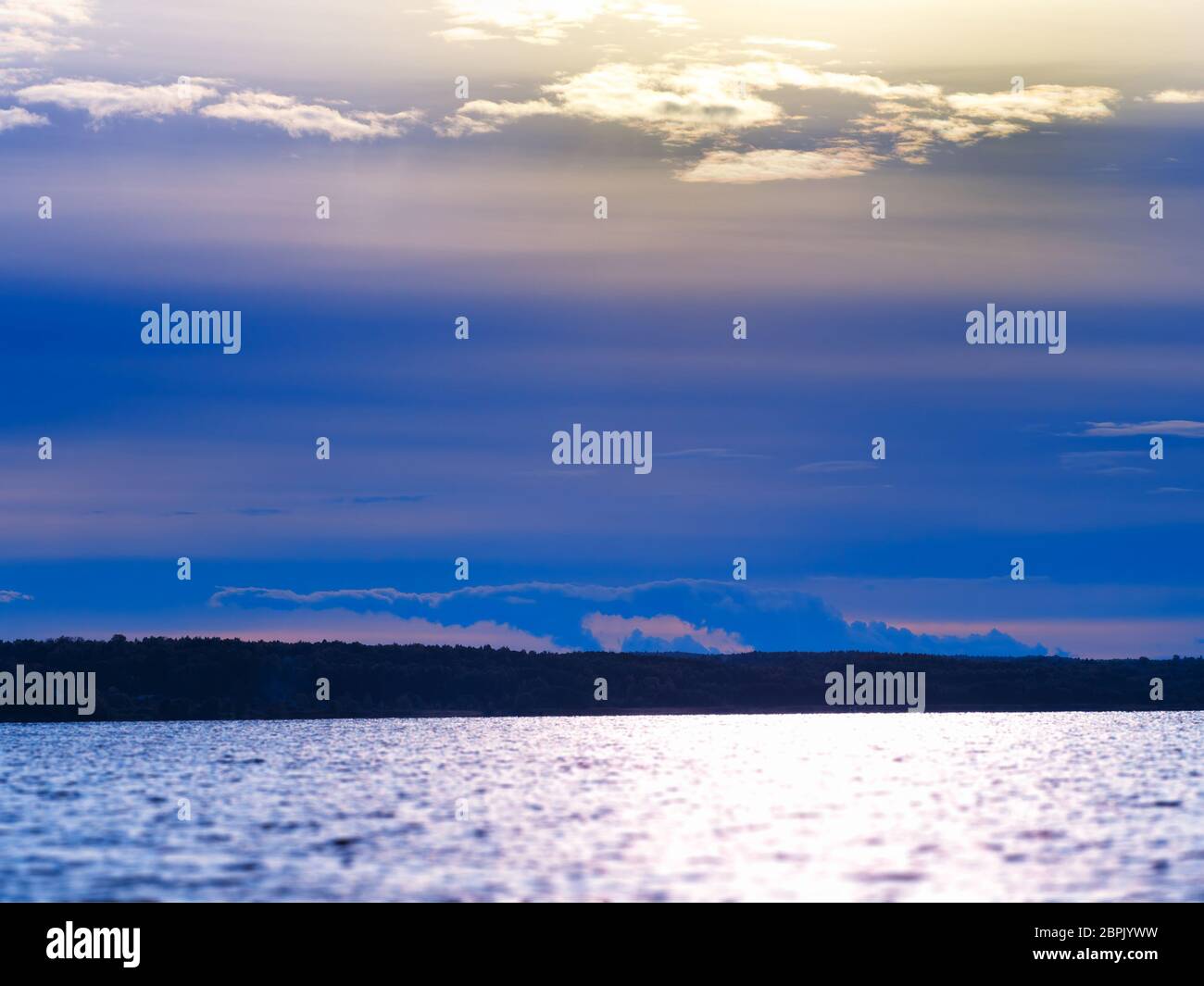 Dramatic pink sunset on river background Stock Photo - Alamy