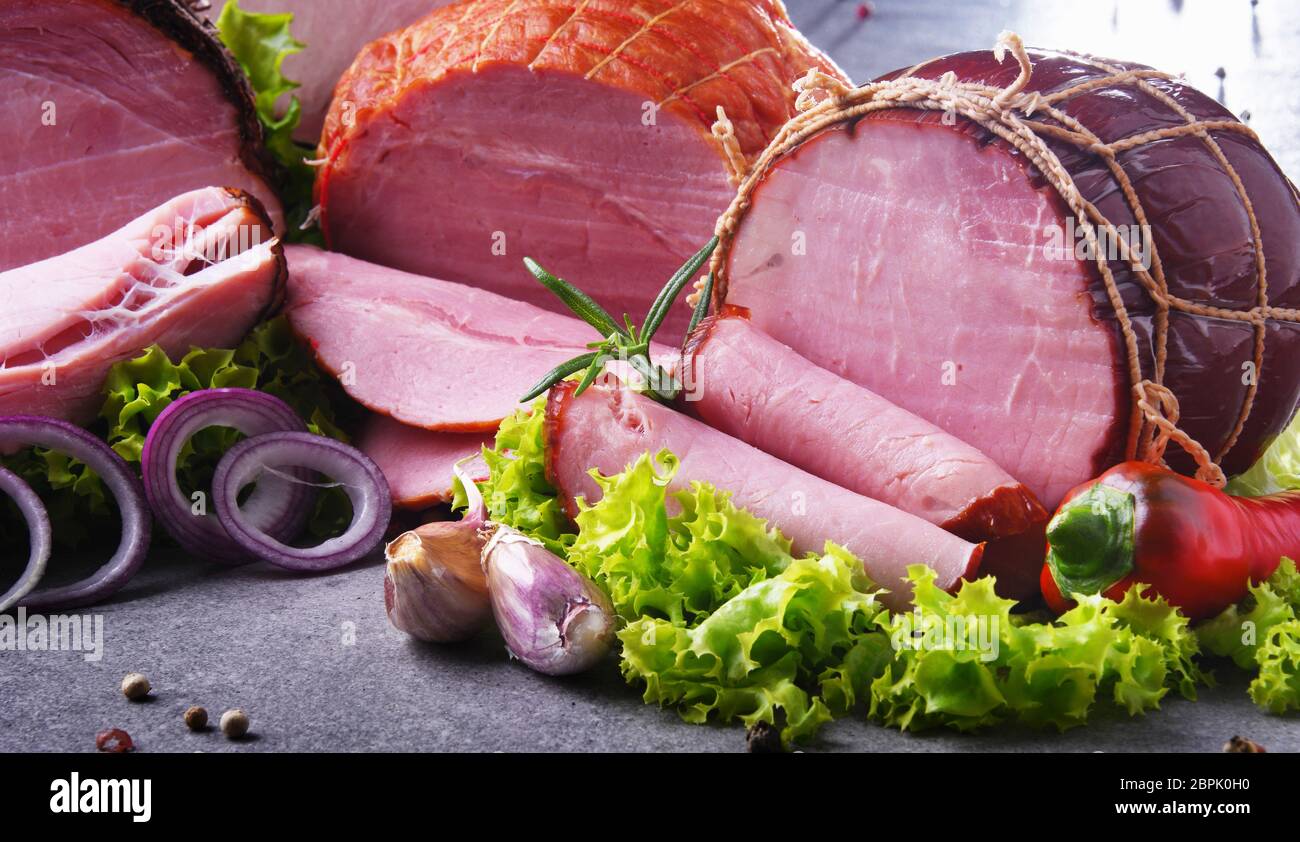 Composition with assorted meat products Stock Photo - Alamy