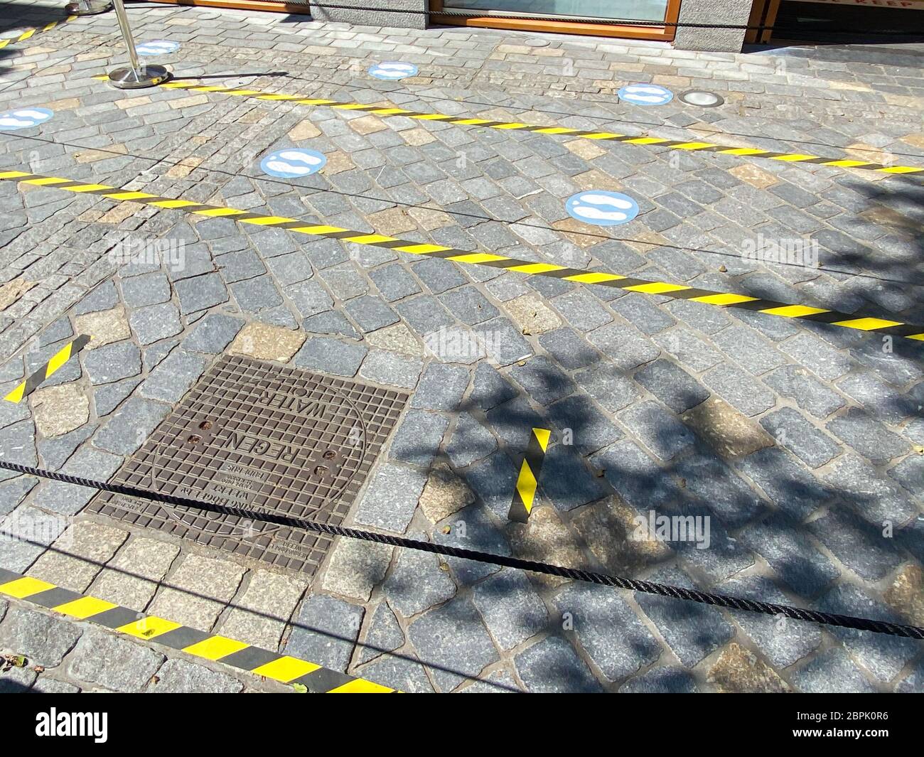 View on do not cross tapes and blue markings to keep distance and ...