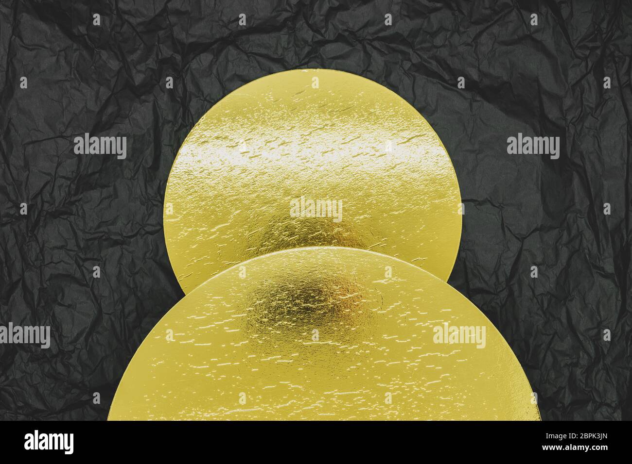 Abstract background of golden shiny craft paper circle on black ...