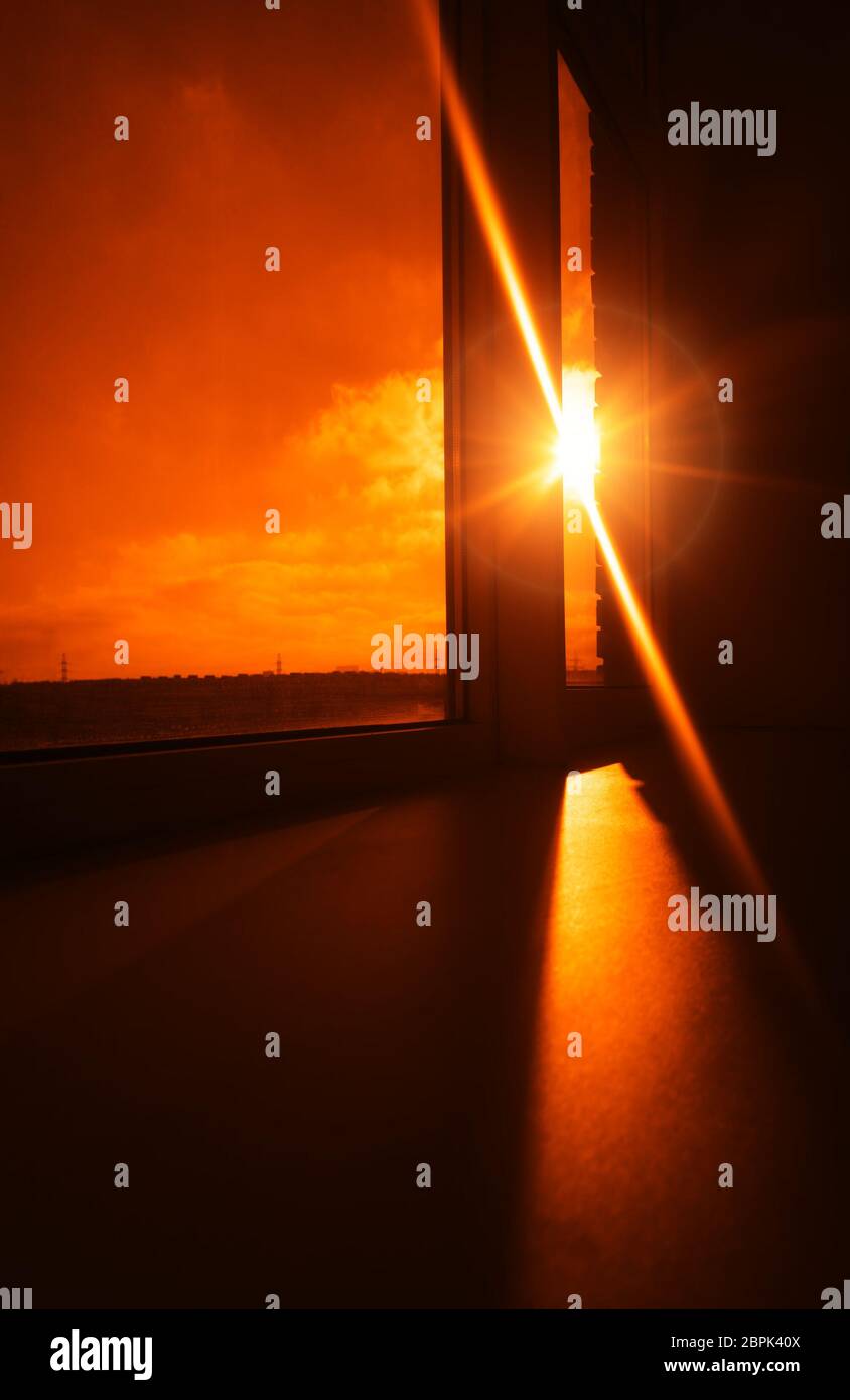 Dramatic sun flare through office window background Stock Photo - Alamy