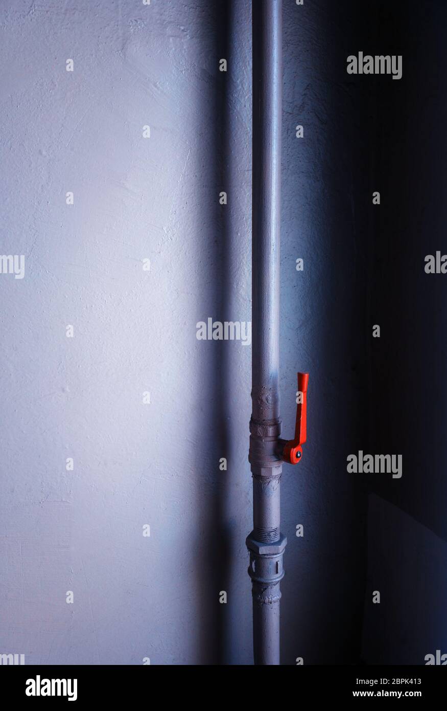 Closed red water-pipe switcher object background Stock Photo - Alamy