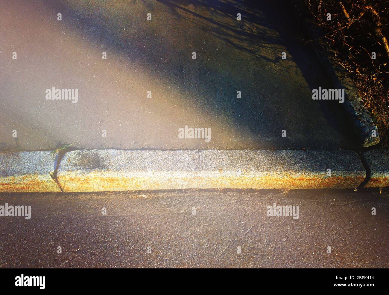Light ray illuminating street pavement background Stock Photo - Alamy