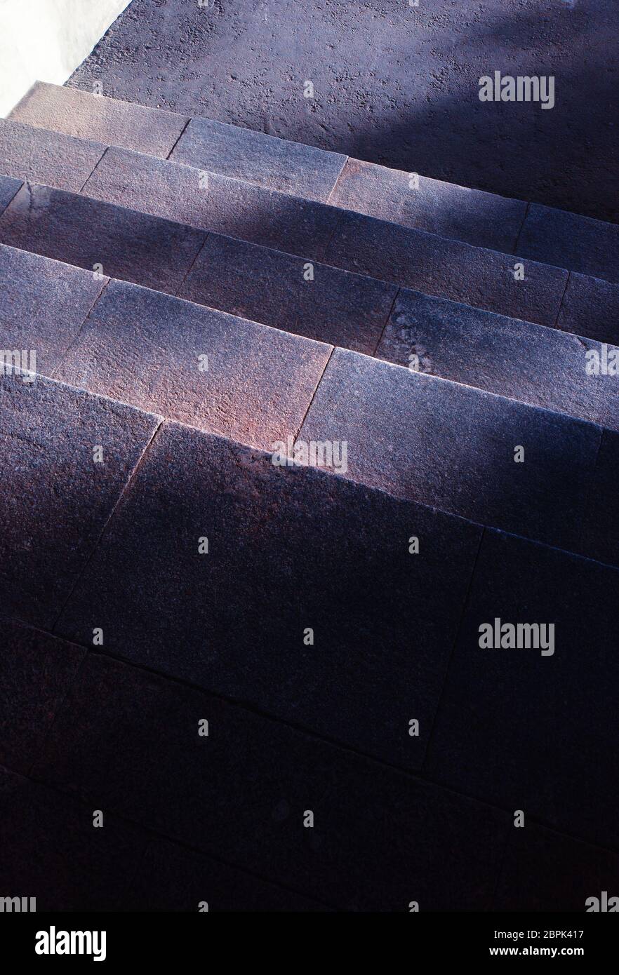 Diagonal concrete stairs during sunset background Stock Photo - Alamy