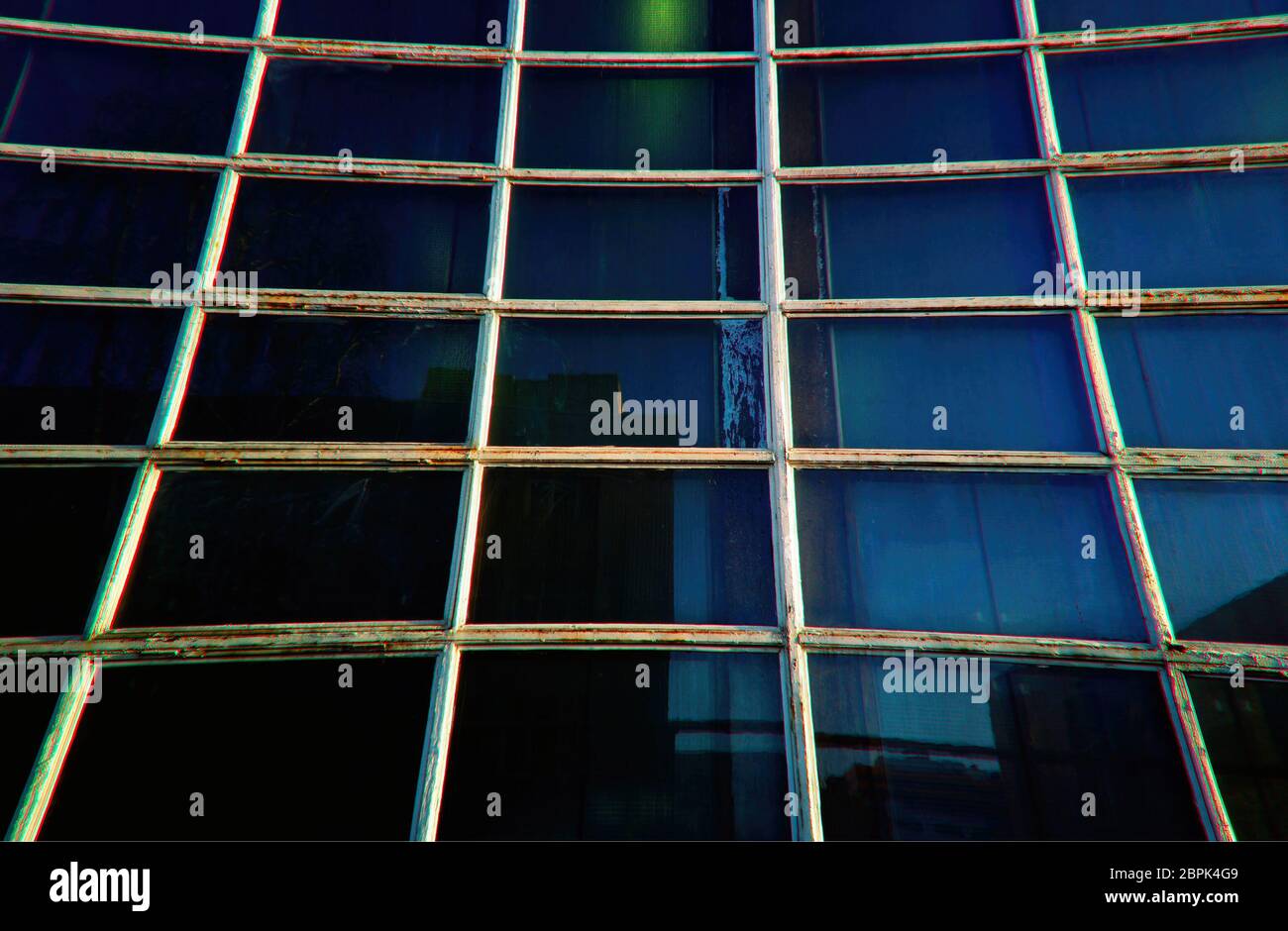 Curved industrial windows of old factory background Stock Photo - Alamy
