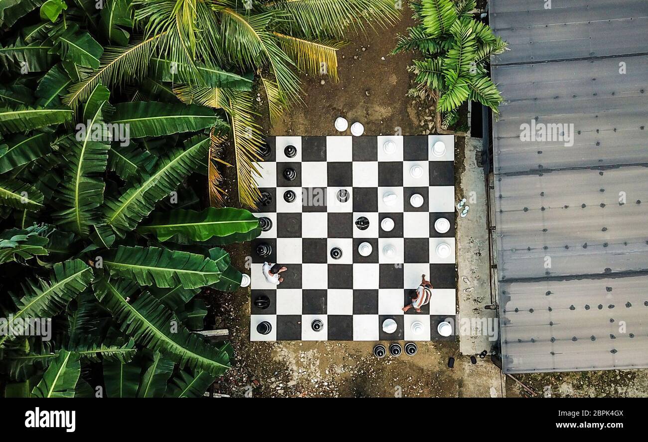 People playing giant chess in hi-res stock photography and images - Alamy