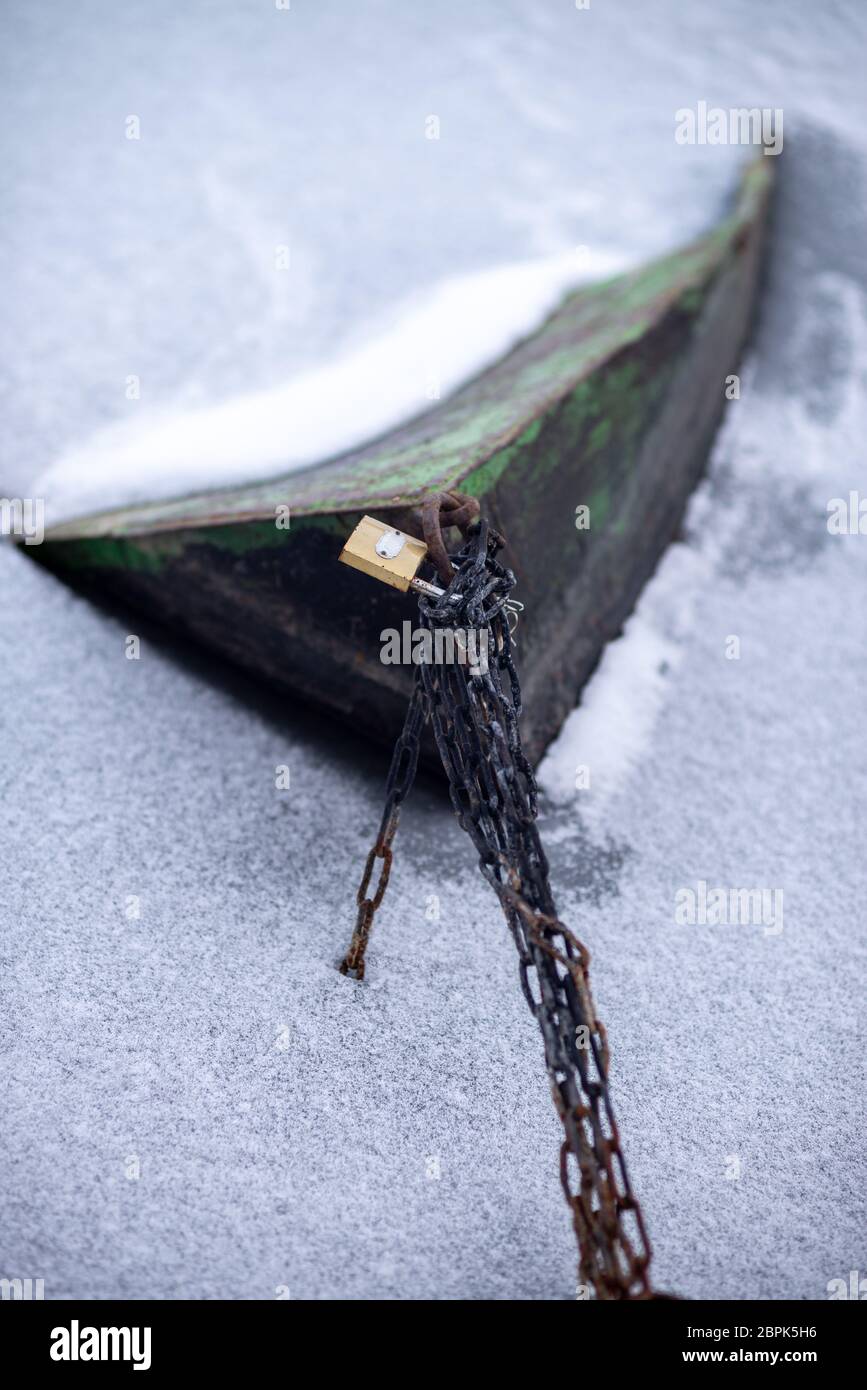 Boat frozen in ice at winter Stock Photo - Alamy