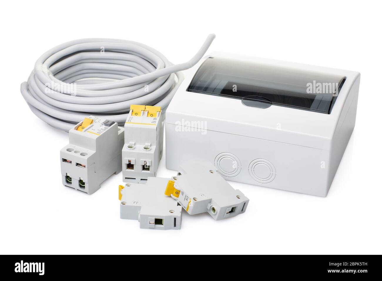 Automatic circuit breakers, distribution box and cable on a white ...