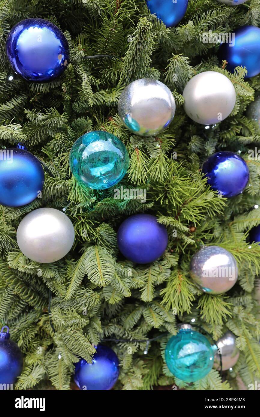 Christmas Tree With Blue Glass Baubles Ornaments Stock Photo - Alamy