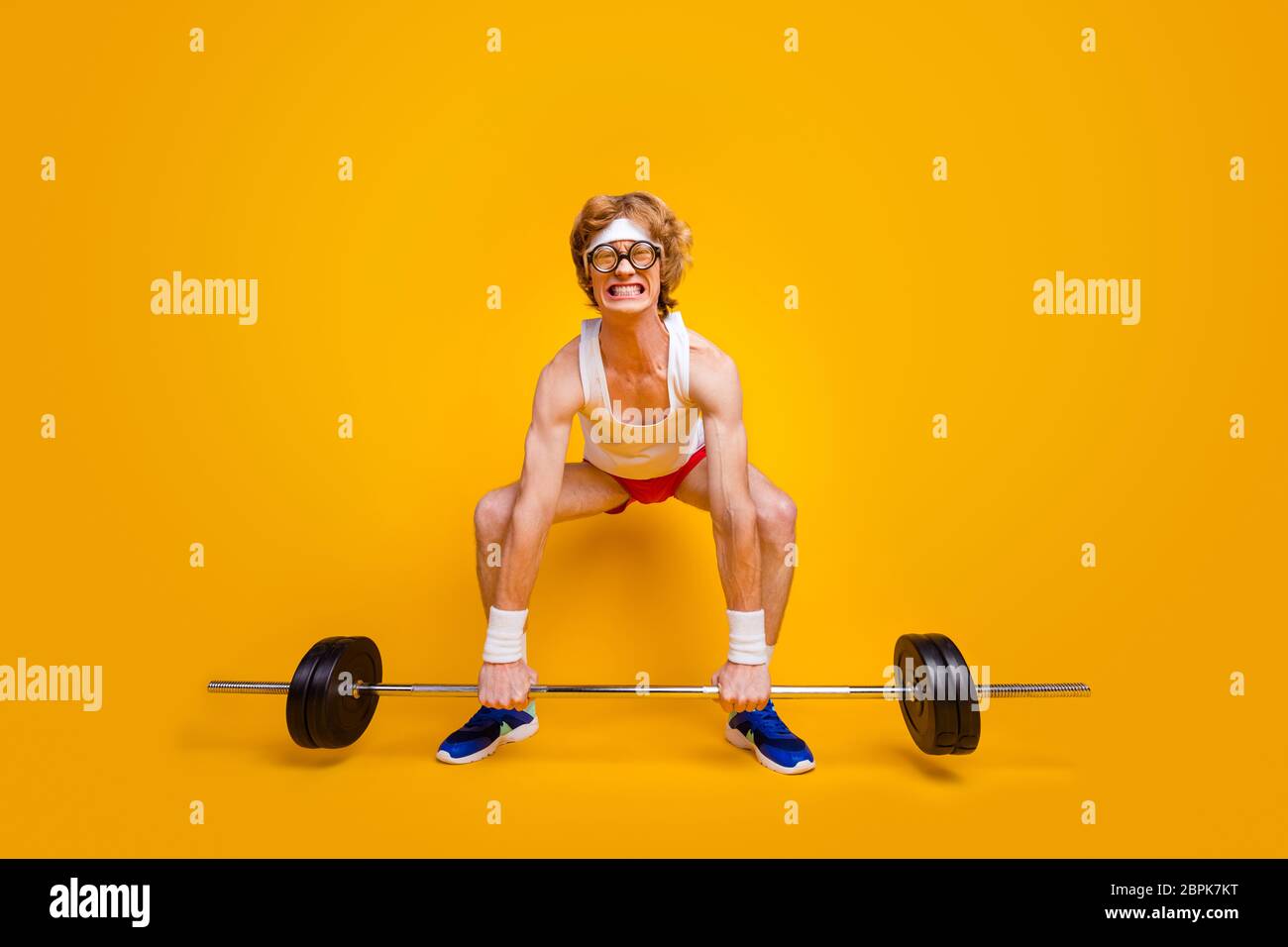 Weak man lifting heavy weight hi-res stock photography and images - Alamy