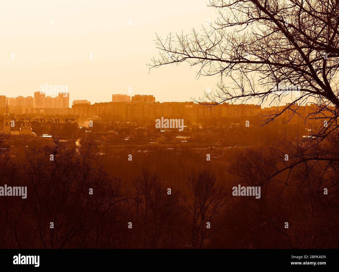 Industrial city during spring sunset background Stock Photo - Alamy