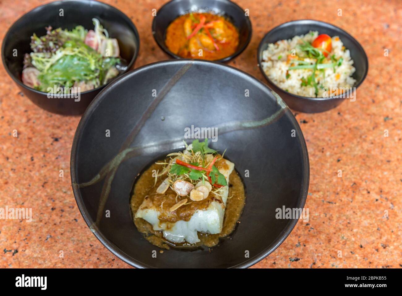 grilled snow fish with lemon grass sauce set Stock Photo - Alamy