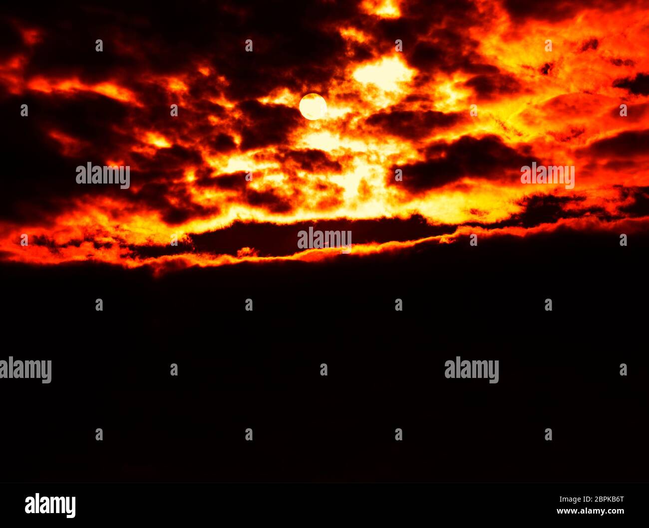 Burning sunset with high altitude clouds background Stock Photo - Alamy
