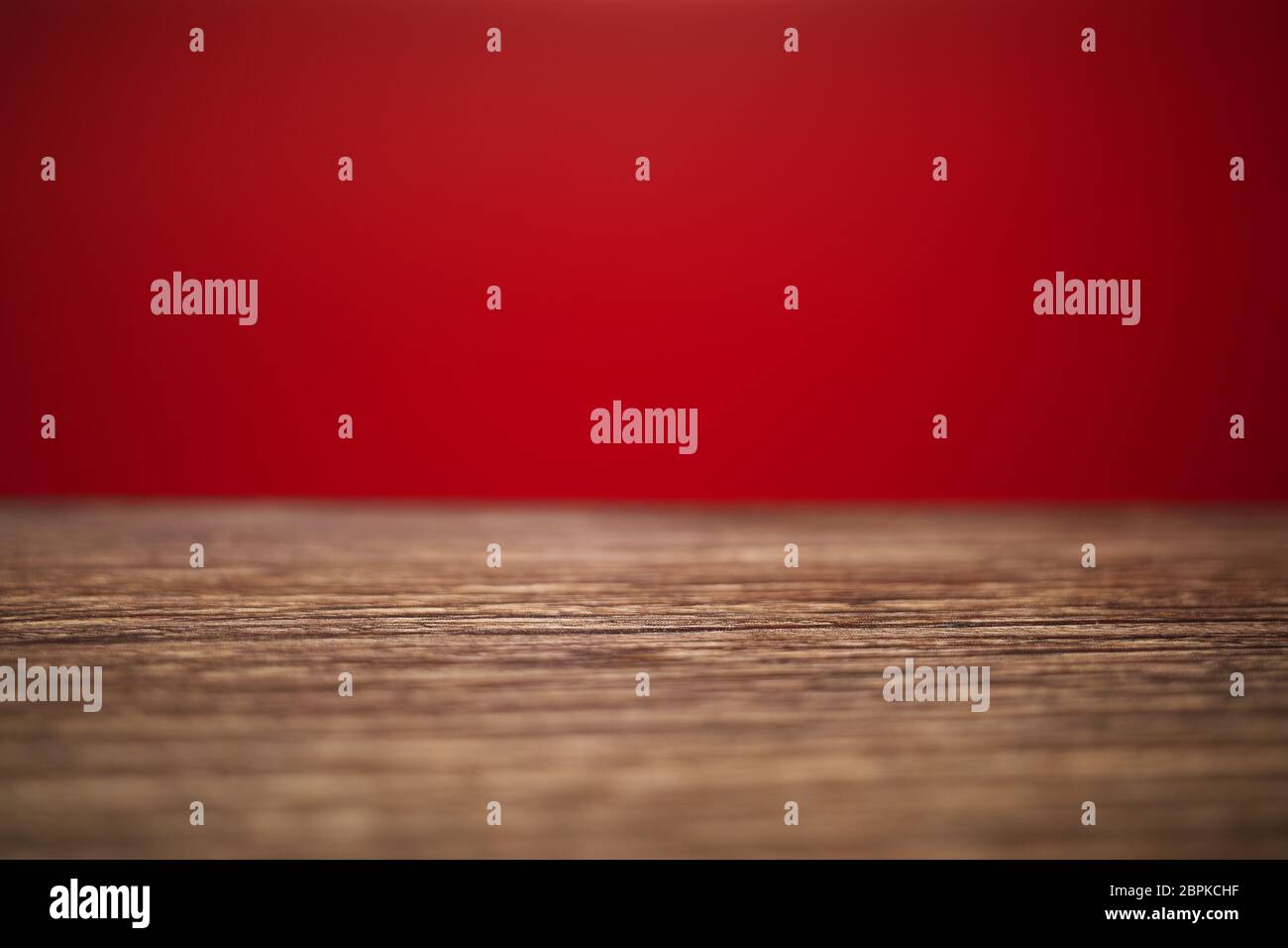 Wooden table surface texture with red bokeh Stock Photo - Alamy