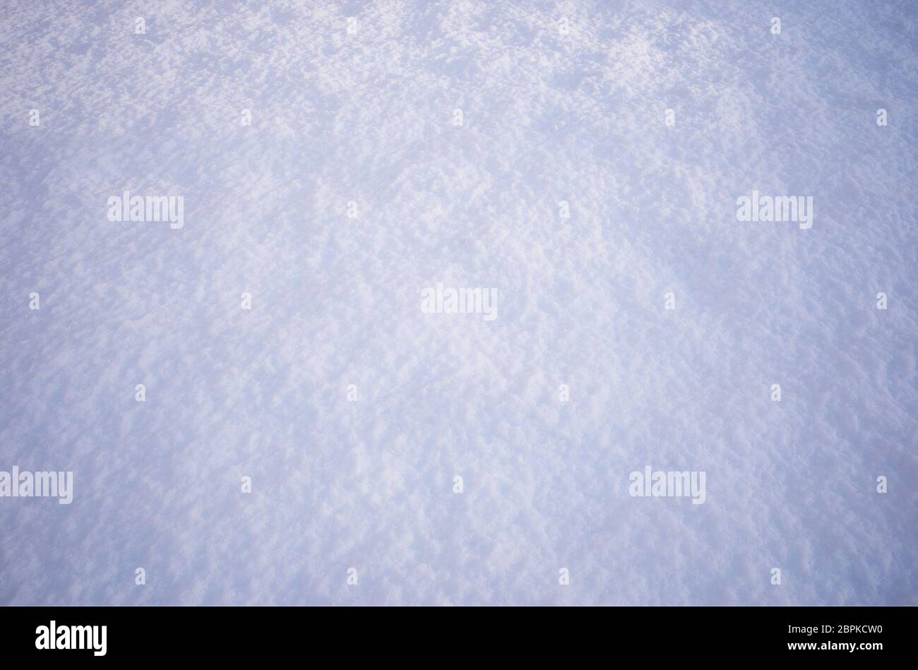 Bumpy frozen snow texture background Stock Photo - Alamy