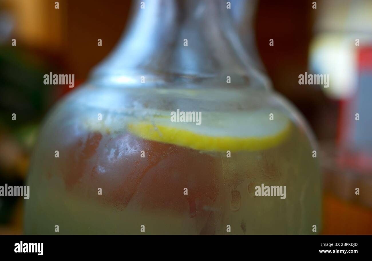 Vodka with lemon alcoholic drink background Stock Photo - Alamy