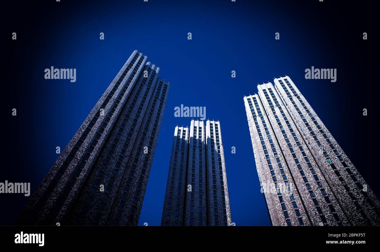 Three skyscraper buildings architecture background Stock Photo - Alamy
