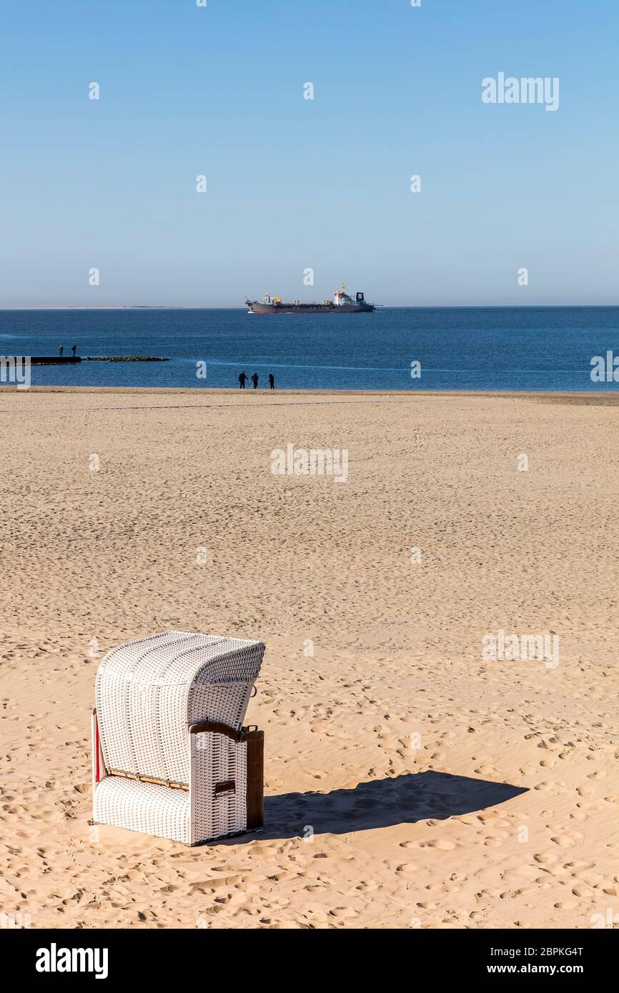 Relaxation on the beach in a beach chair Stock Photo - Alamy