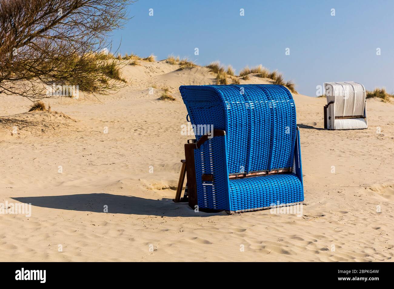 Relaxation on the beach in a beach chair Stock Photo - Alamy