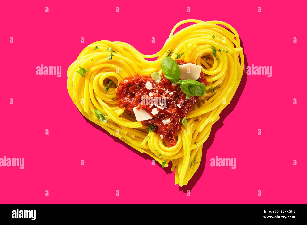 Decorative heart-shaped Italian pasta portion, formed of cooked ...