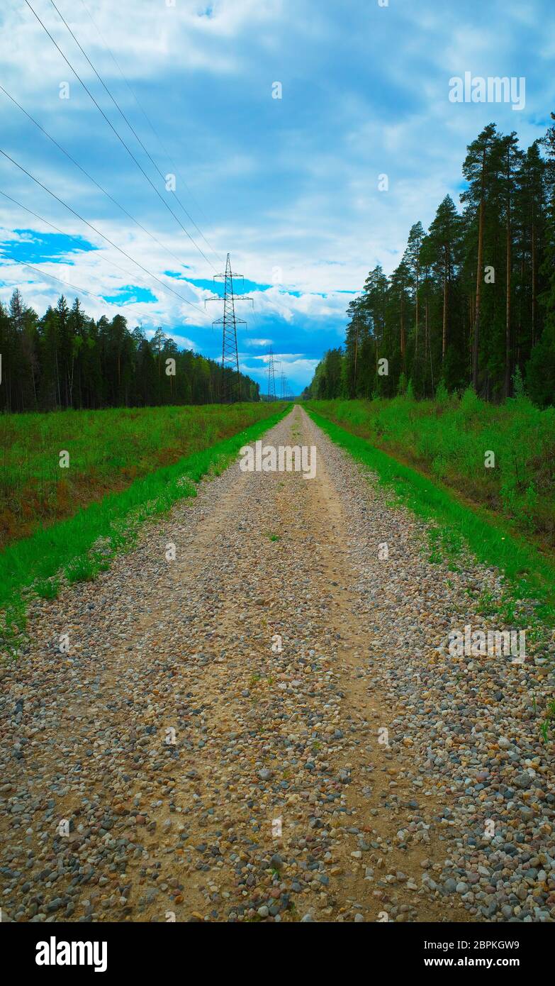 Countryside gravel road transportation background Stock Photo - Alamy