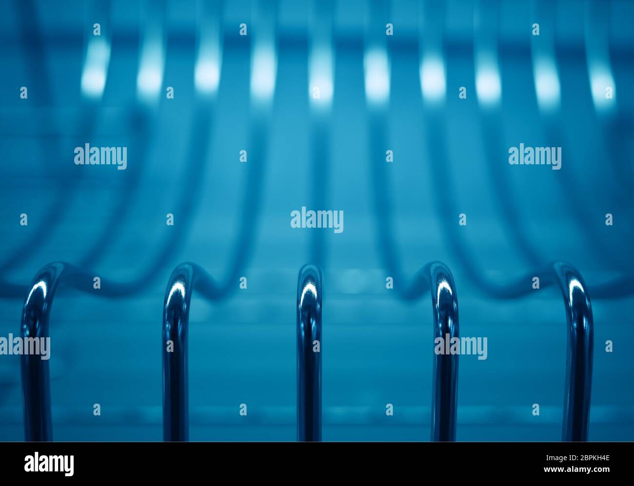 Blue curved pipes abstract background Stock Photo - Alamy