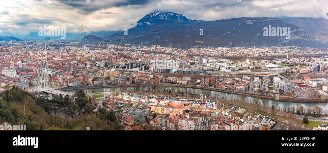Scenic panoramic aerial view of the banks of the Isere river, bridge ...