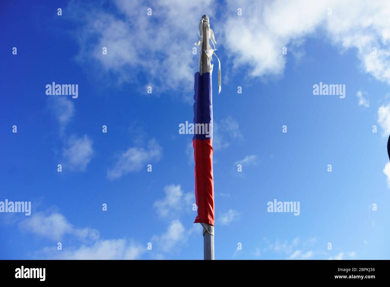 the Russian flag is damaged, the Russian flag is torn Stock Photo - Alamy