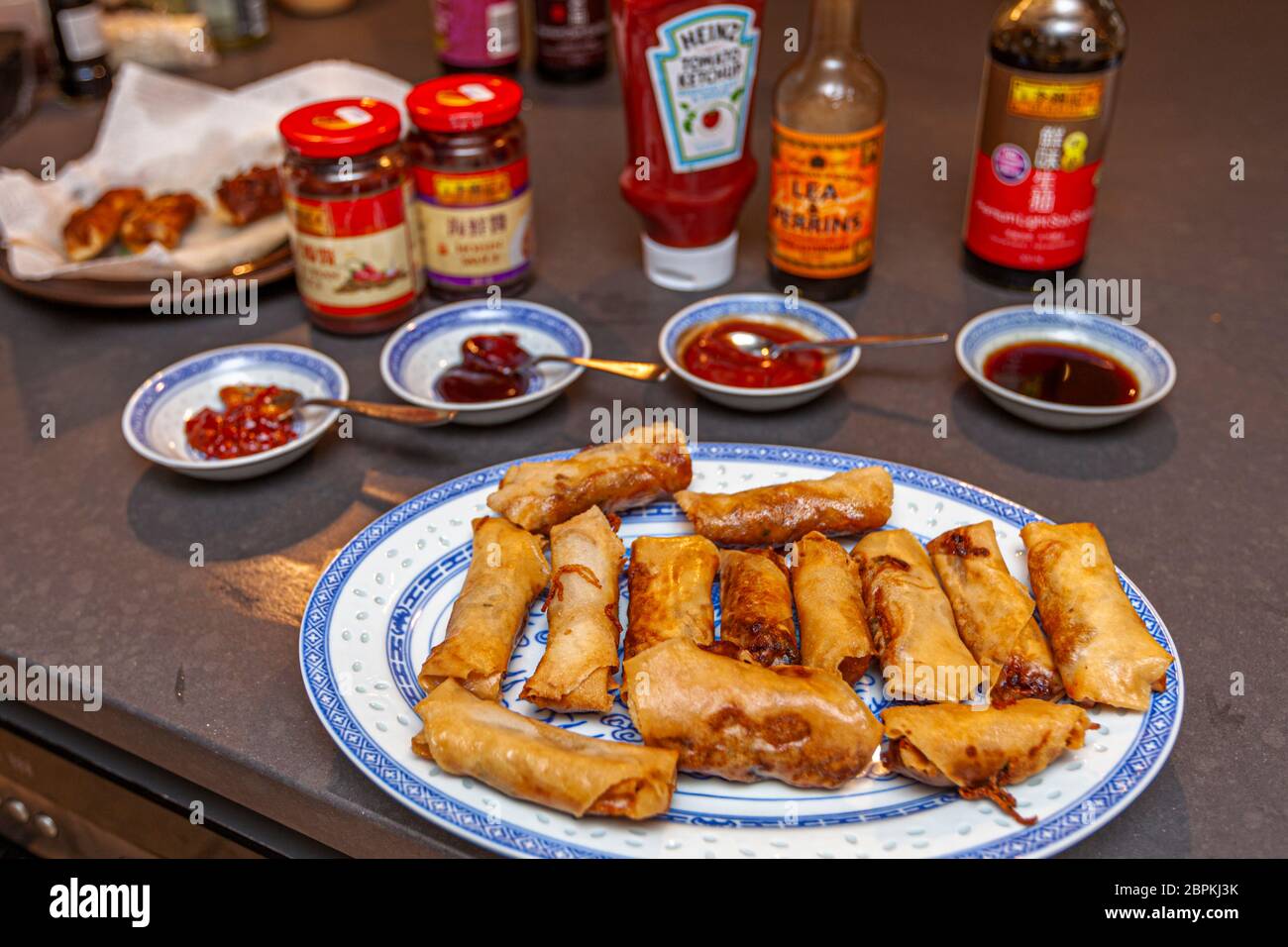 Chinese spring rolls are served with spicy sauces Stock Photo - Alamy